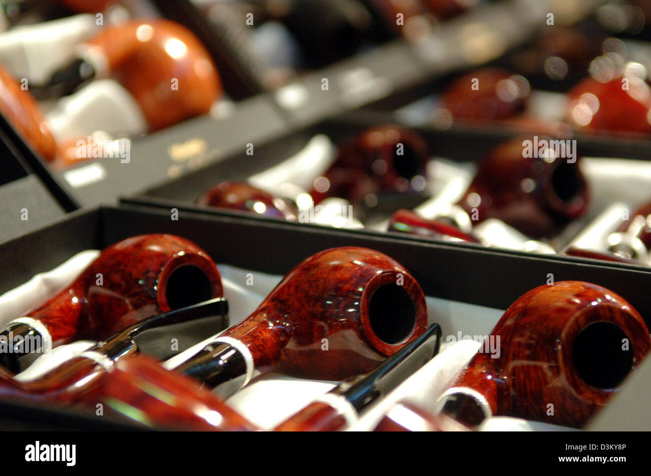 (dpa) - The picture shows several tobacco pipes at a display of a booth ...