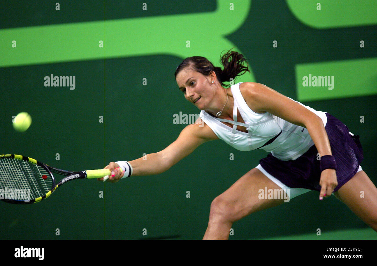 (dpa) - German Tennis pro Stephanie Gehrlein tries to reach a ball in ...