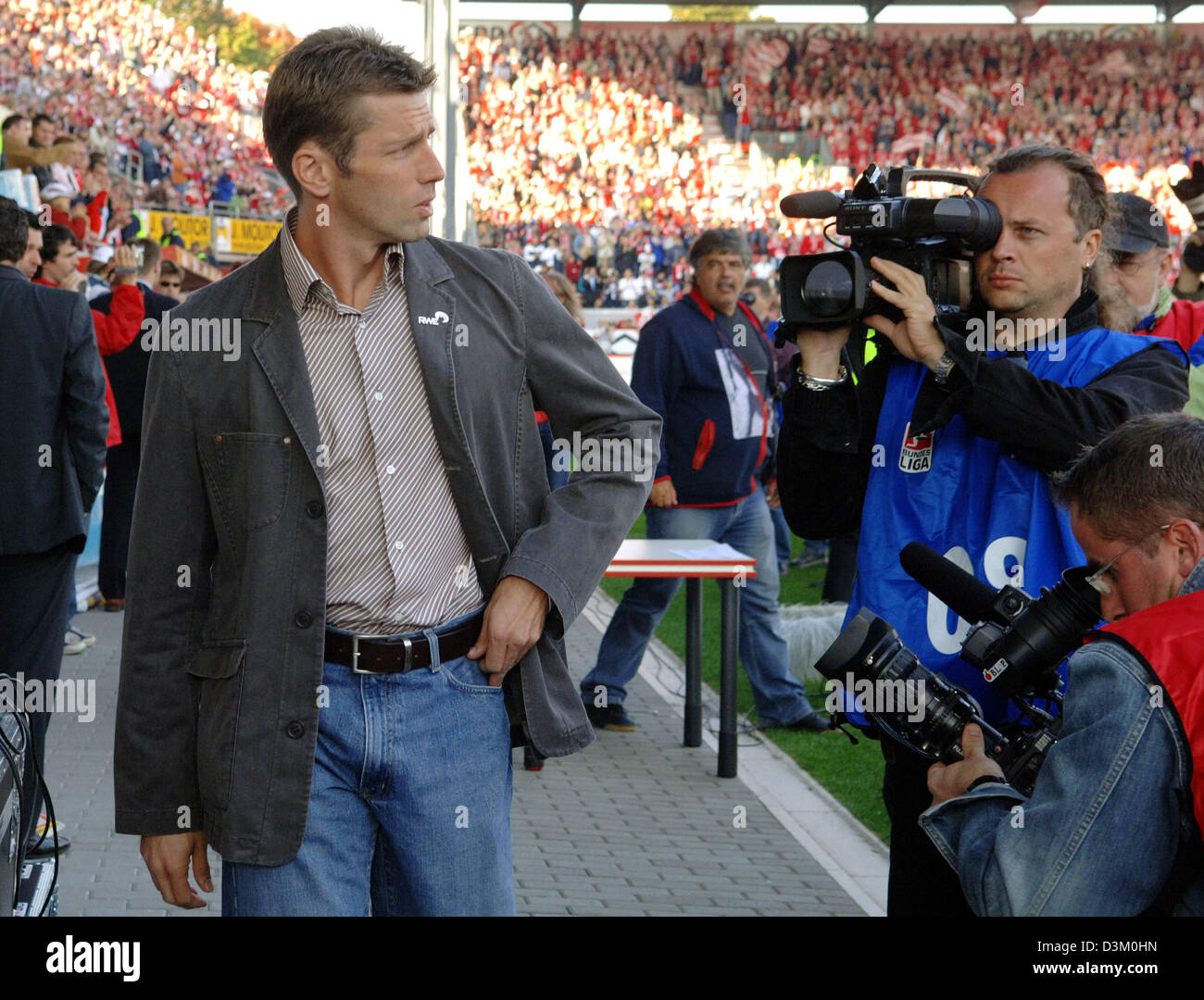 (dpa) - The new coach of Leverkusen Michael Skibbe stands at the side ...