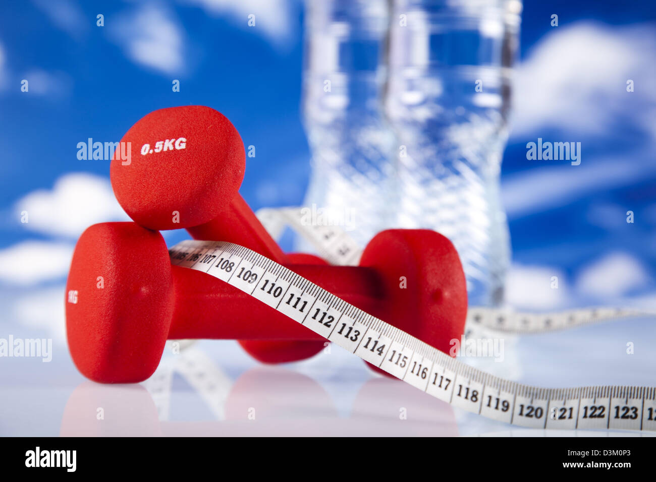 Measuring of dumbbell Stock Photo - Alamy
