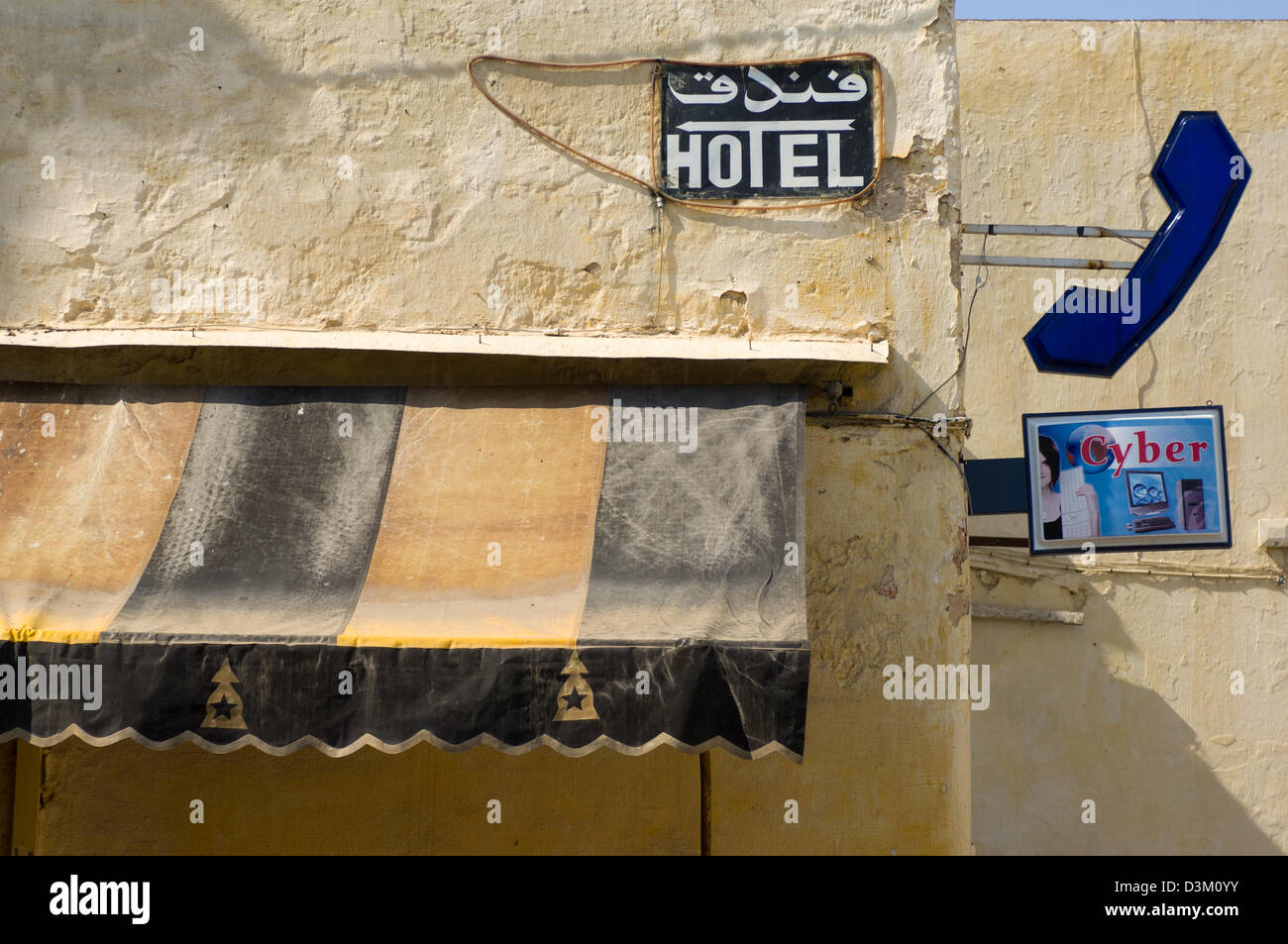 Hotel and telephone signs in the Medina of Fes, Morocco Stock Photo - Alamy