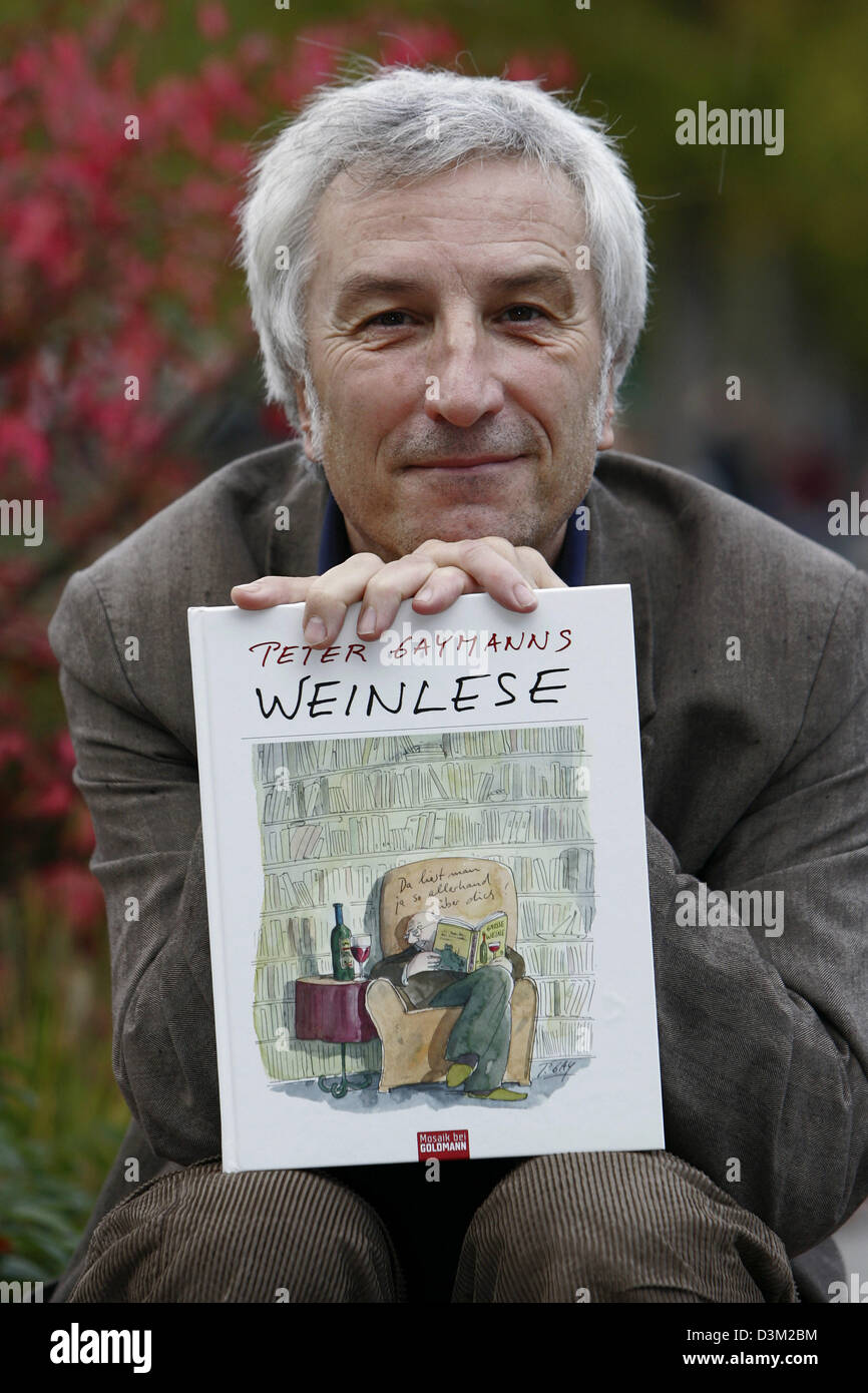 (dpa) - German illustrator and cartoonist Peter Gaymann presents his ...