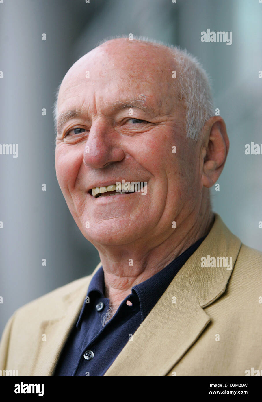 (dpa) - Author Egon Gramer smiles at the Frankfurt Book Fair 2005 in ...