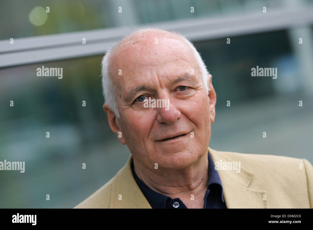 (dpa) - Author Egon Gramer smiles at the Frankfurt Book Fair 2005 in ...