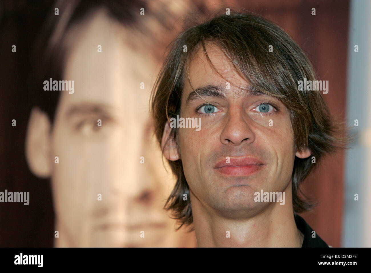 (dpa) - Author Richard Precht smiles at the Frankfurt Book Fair 2005 in ...