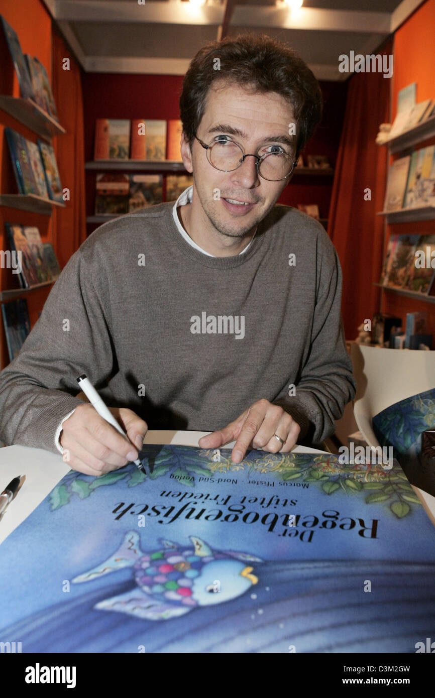 (dpa) - Swiss illustrator and author Marcus Pfister smiles at the ...