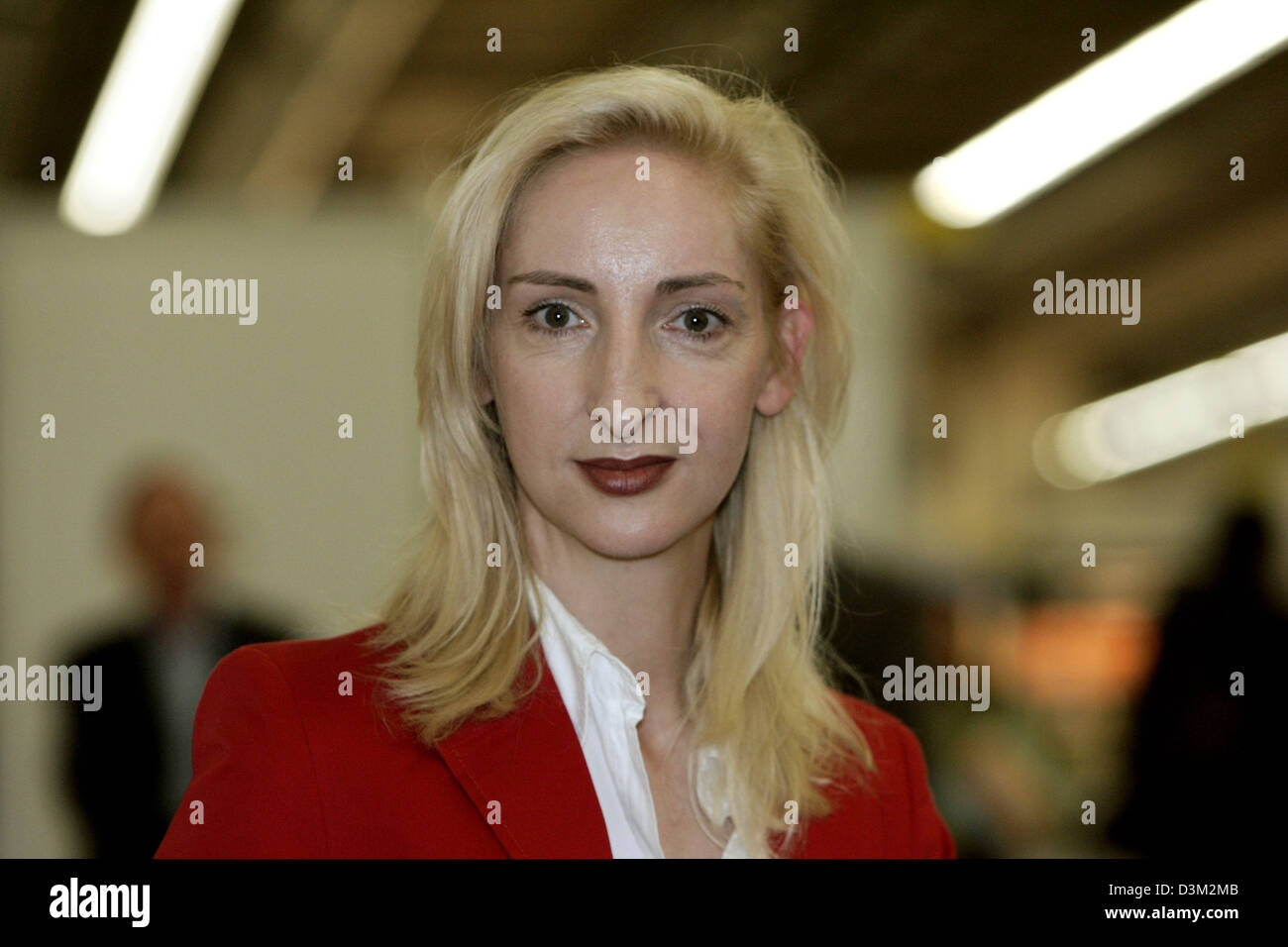 (dpa) - Publisher, photo- and music journalist Corinna Weidner smiles ...