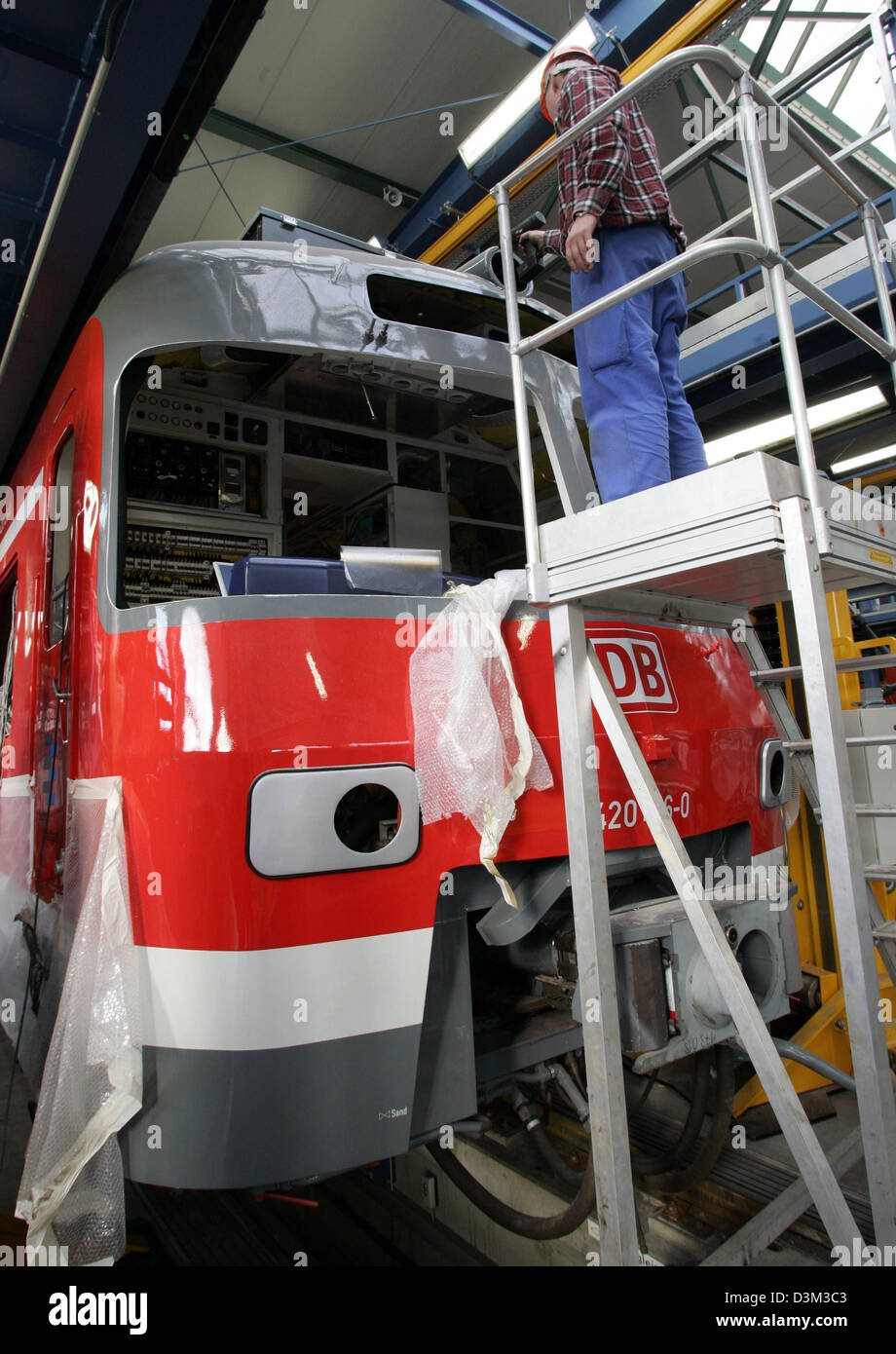 (dpa) - A locomotive is repaired in the maintenance plant of the ...