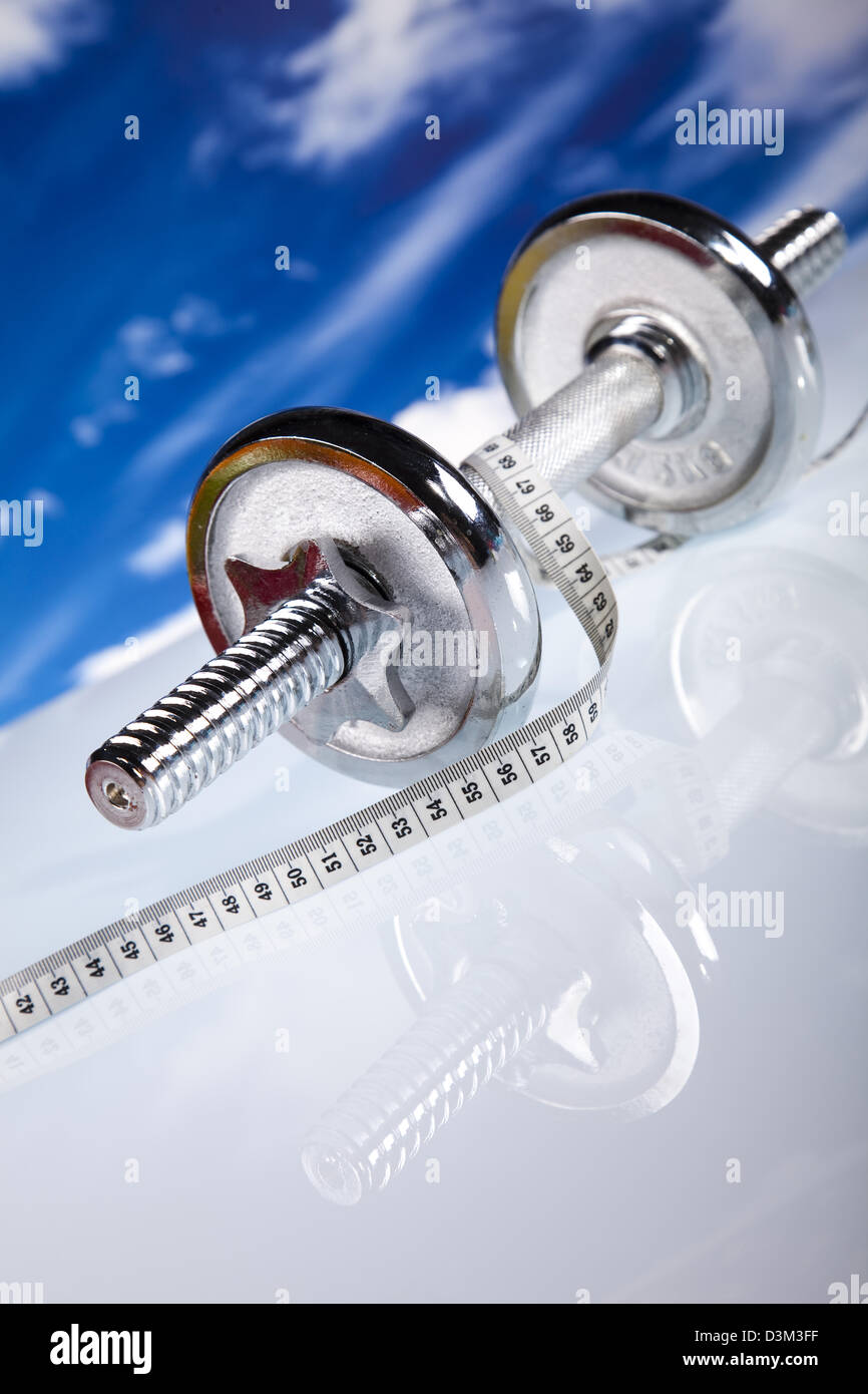 Measuring of dumbbell Stock Photo - Alamy