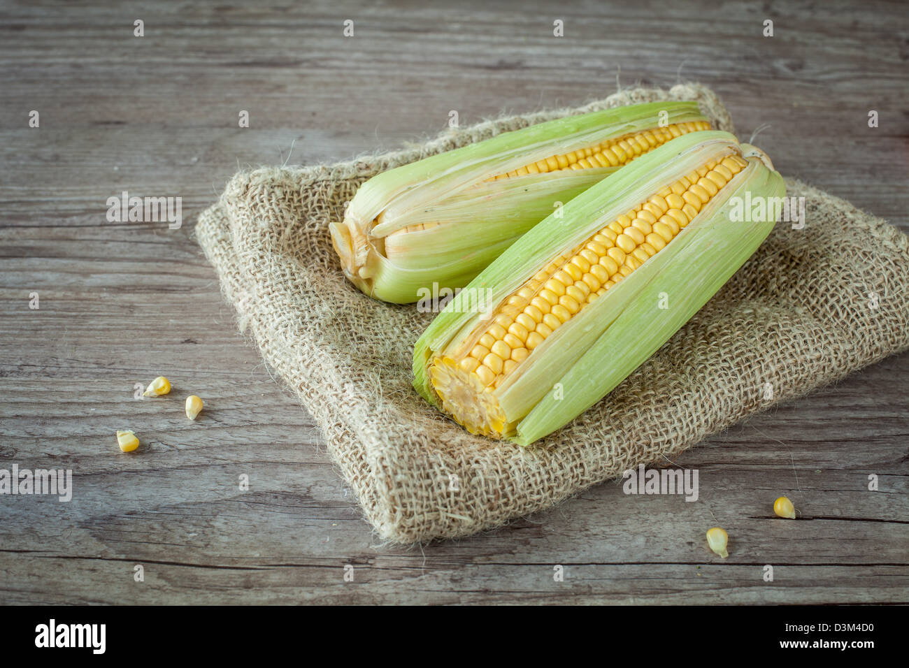 Assortment of fresh corn on wood background Stock Photo - Alamy
