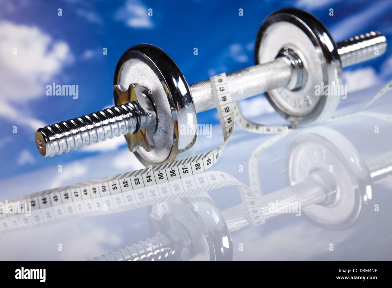 Measuring of dumbbell Stock Photo - Alamy