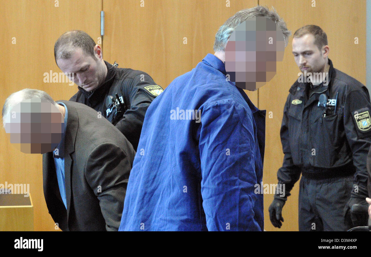 Defendants Raimond M. (L) and his brother Rudolf R. (R) appear at the ...