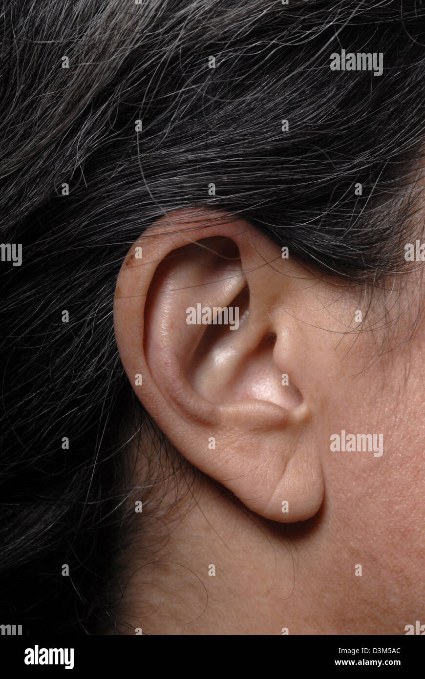 woman one ear close up listening Stock Photo - Alamy