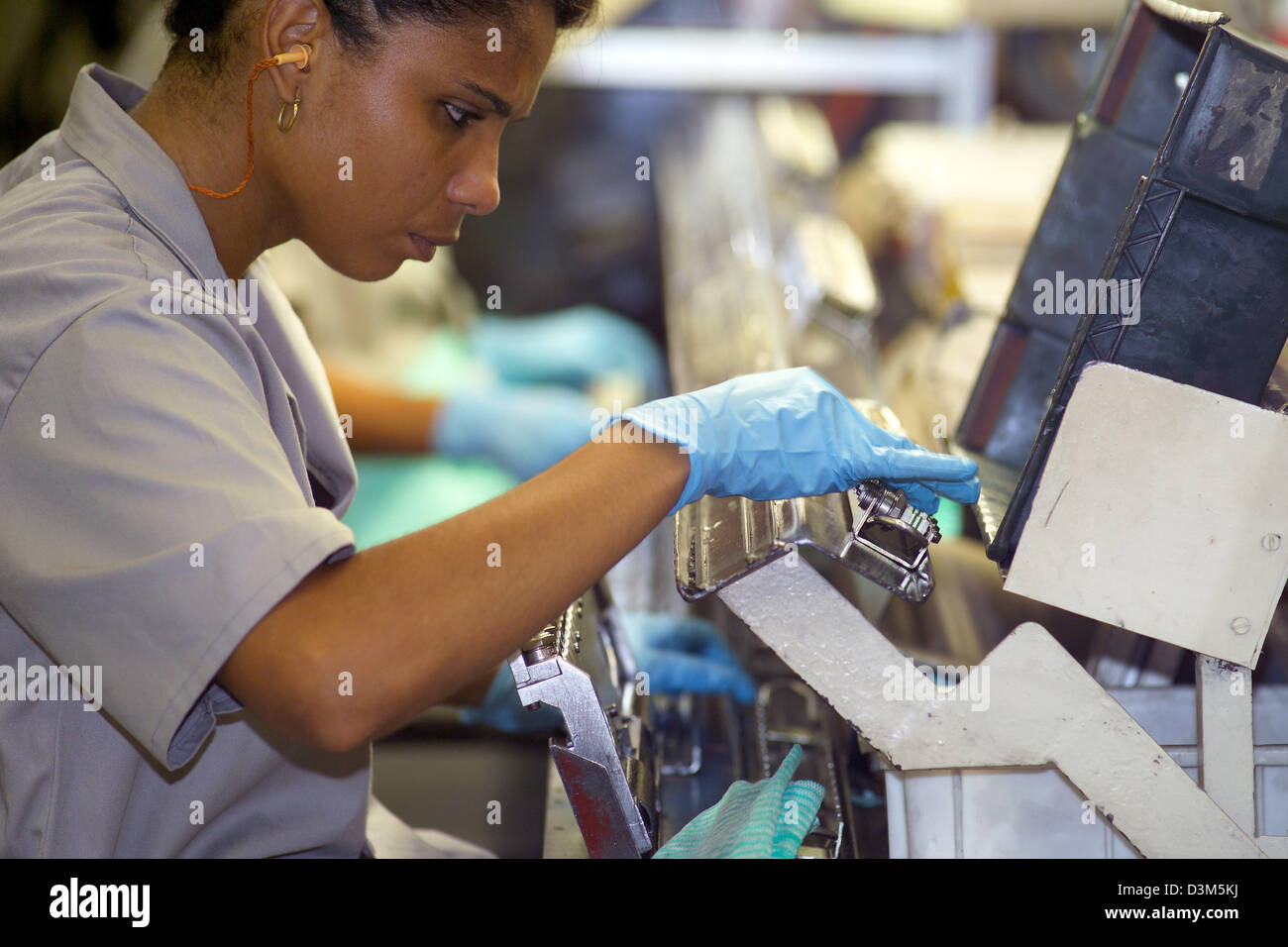 (dpa) - The photo shows the final manufacturing stage of spark plugs at ...