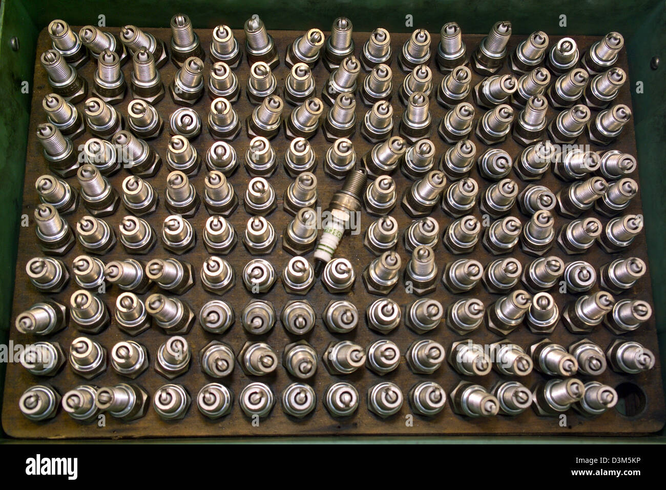 (dpa) - The photo shows spark plugs at the final manufacturing stage at ...
