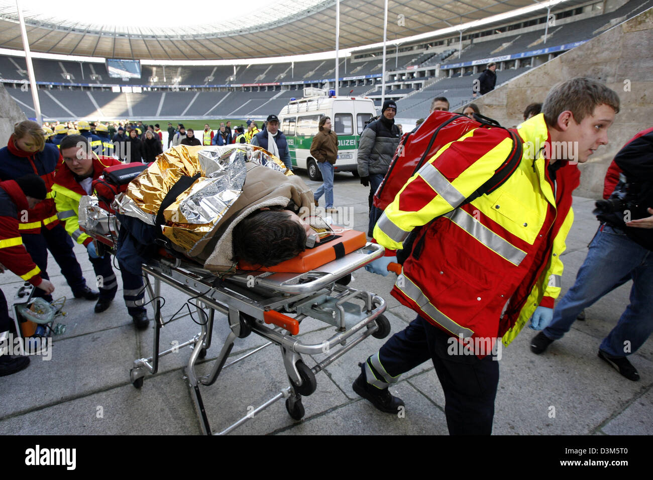 (dpa) - Ambulance men transport a pretending hurt persin in the Olympic ...
