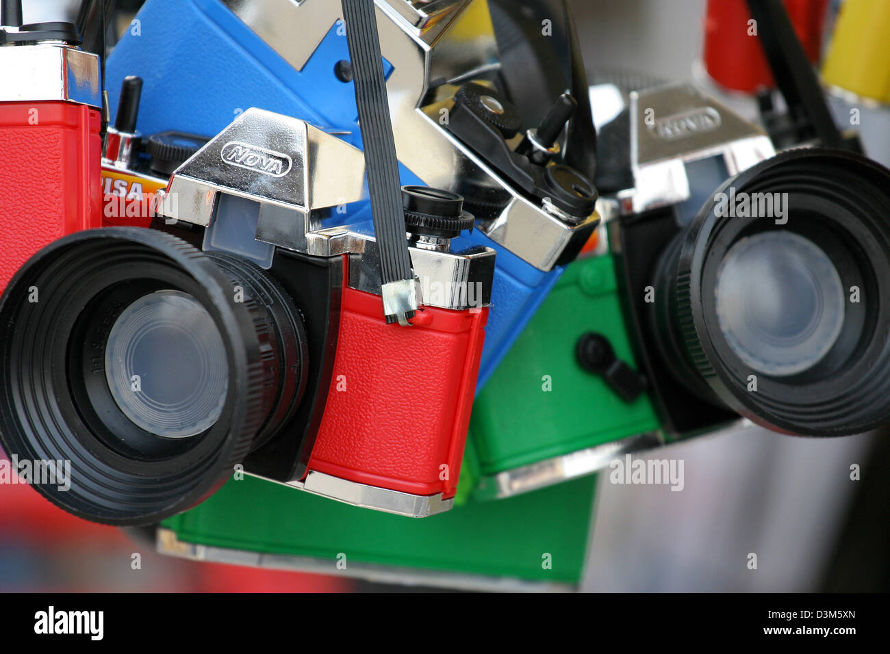 (dpa) - Colourful plastic cameras are sold as souvenirs in Pisa, Italy ...