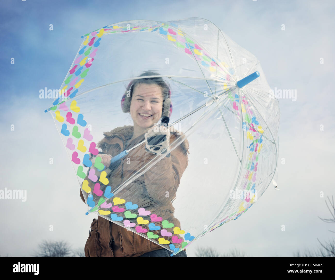 Portrait of a young girl outside in a park on a snowy winter day Stock ...