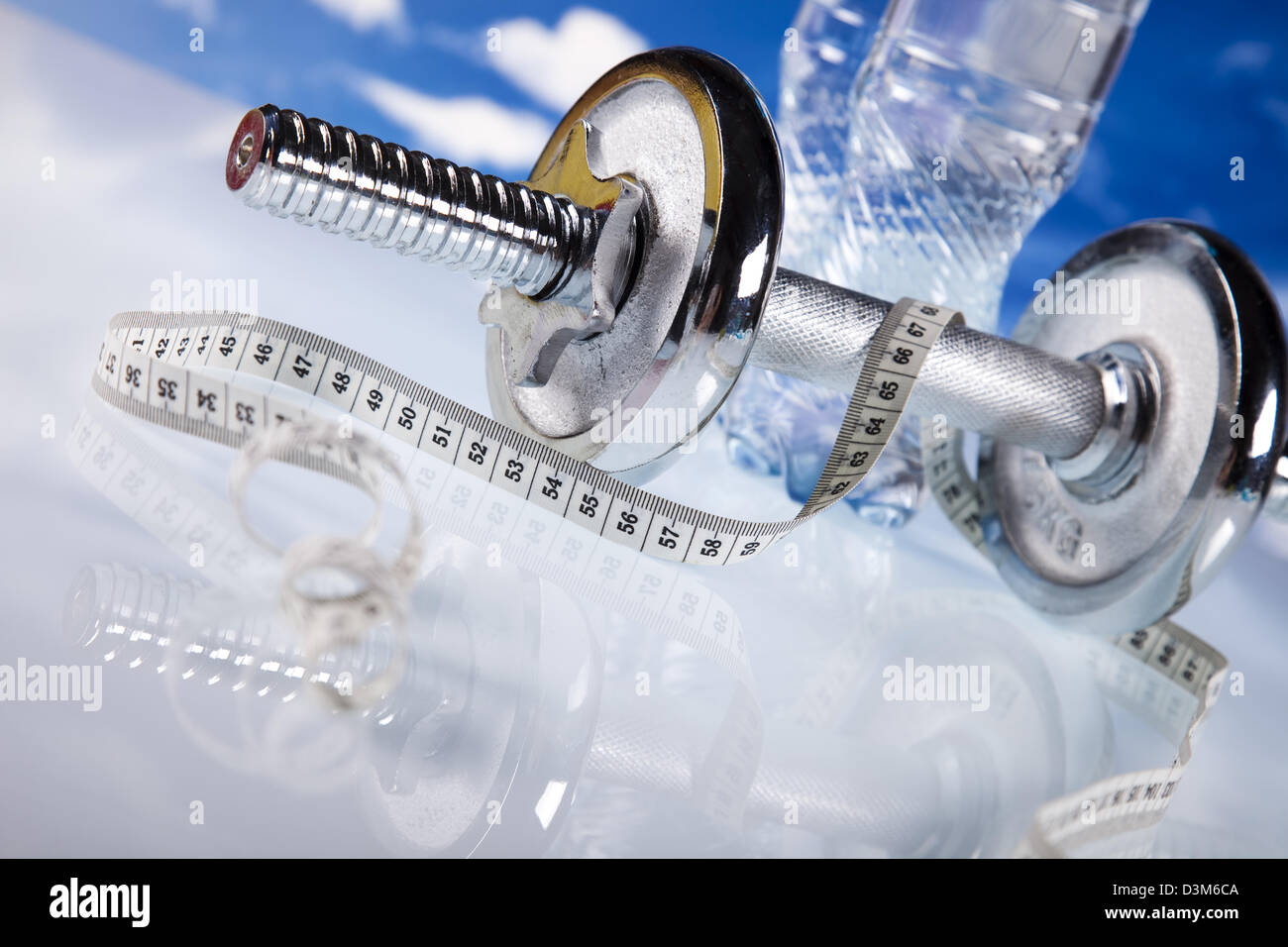 Measuring of dumbbell Stock Photo - Alamy