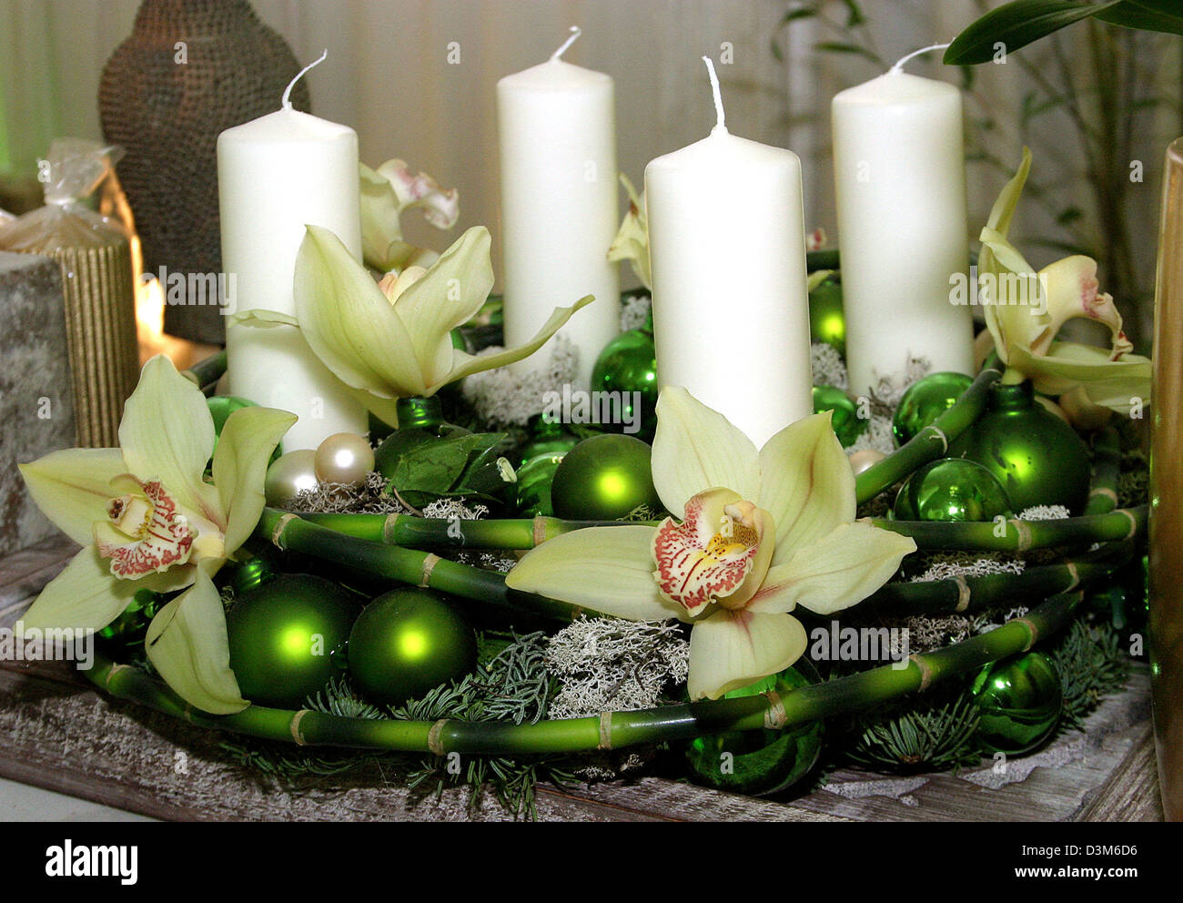 (dpa) - An Advent wreath featuring white candles appears exotic because ...