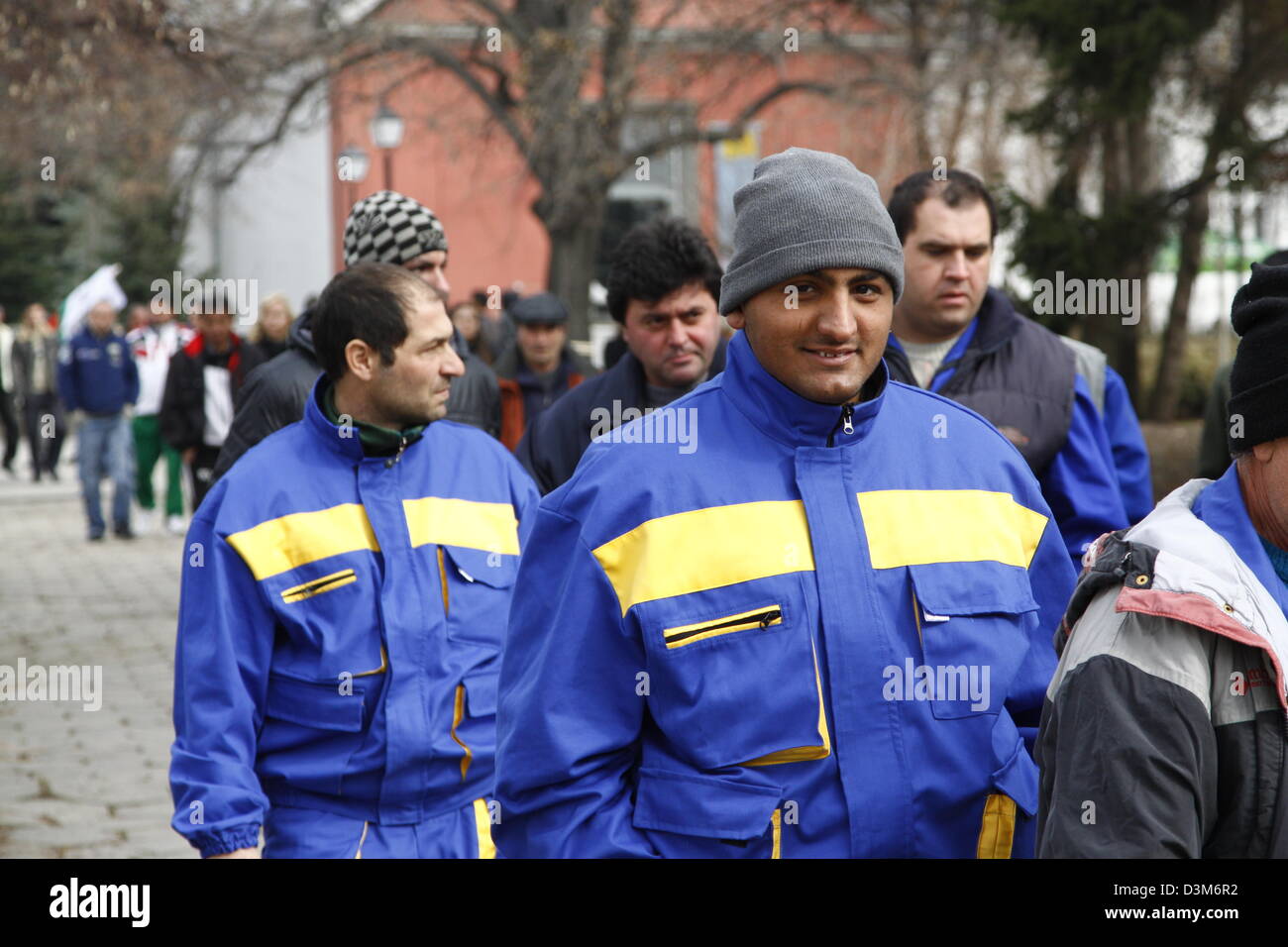 Sofia, Bulgaria; 21/02/2013. Workers arriving in front of the ...