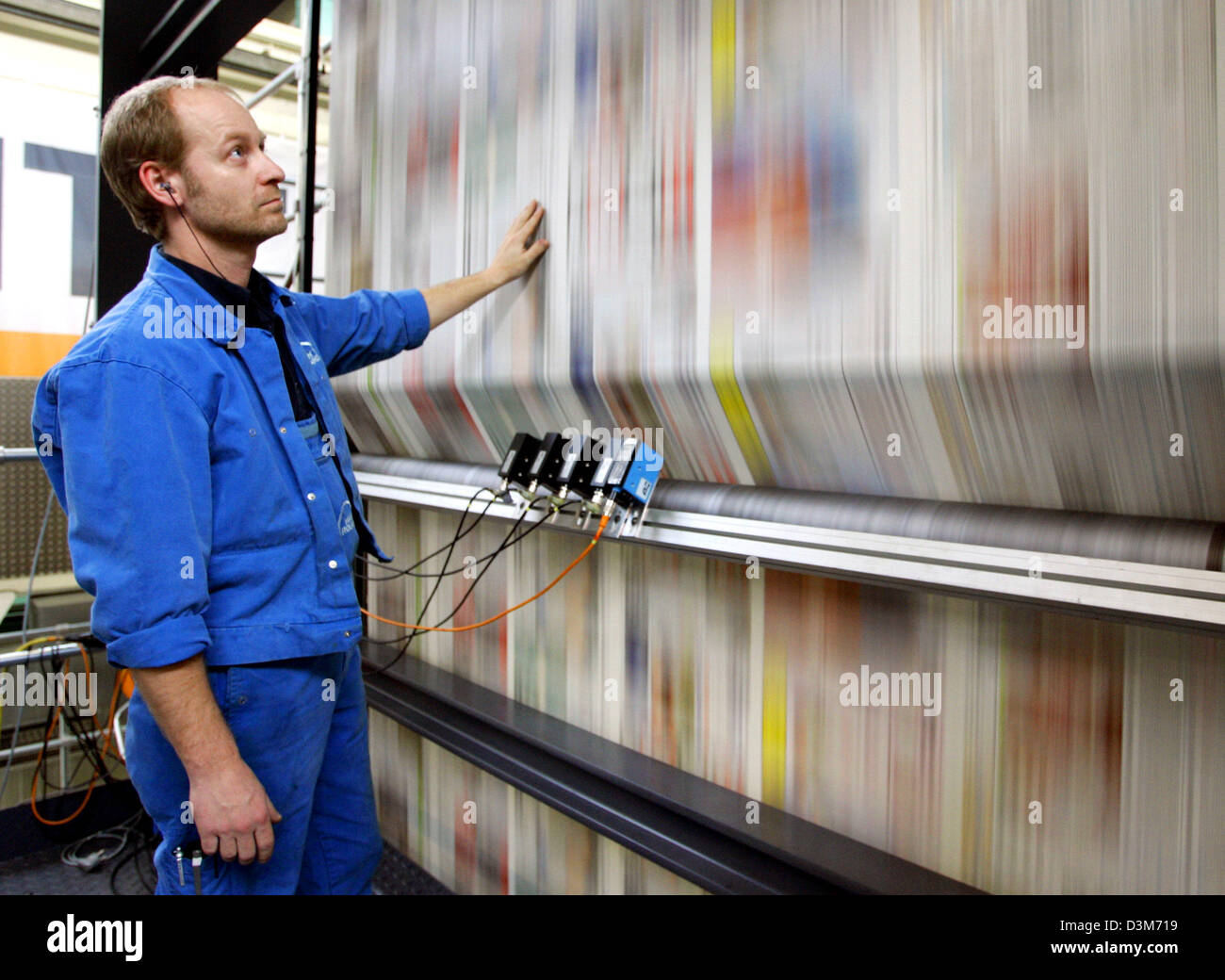 Economy business finance ebf male standing touching checking newspaper ...