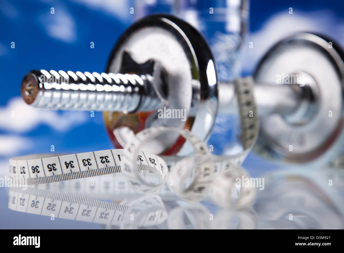 Measuring of dumbbell Stock Photo - Alamy