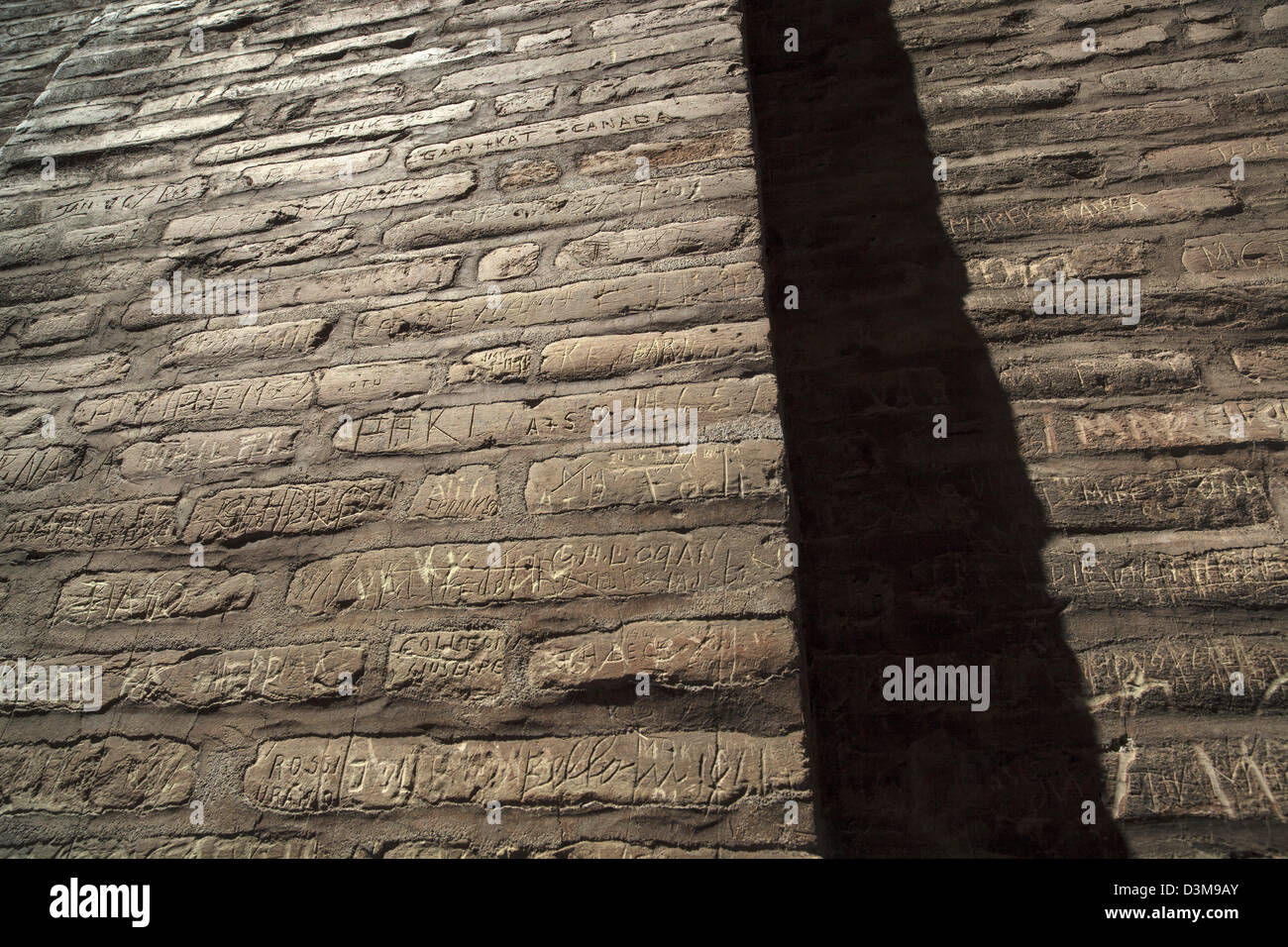 Graffiti from several centuries carved into the walls of the Colosseum ...