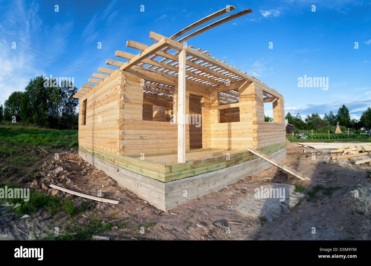 Wooden house under construction Stock Photo - Alamy