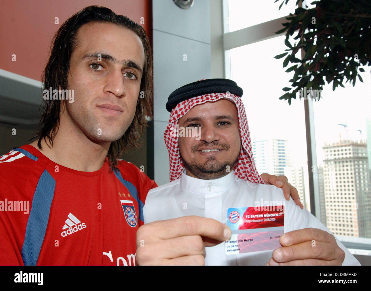 (dpa) - Ali Karimi, player of the Bundeliga team Bayern Munich, shows ...