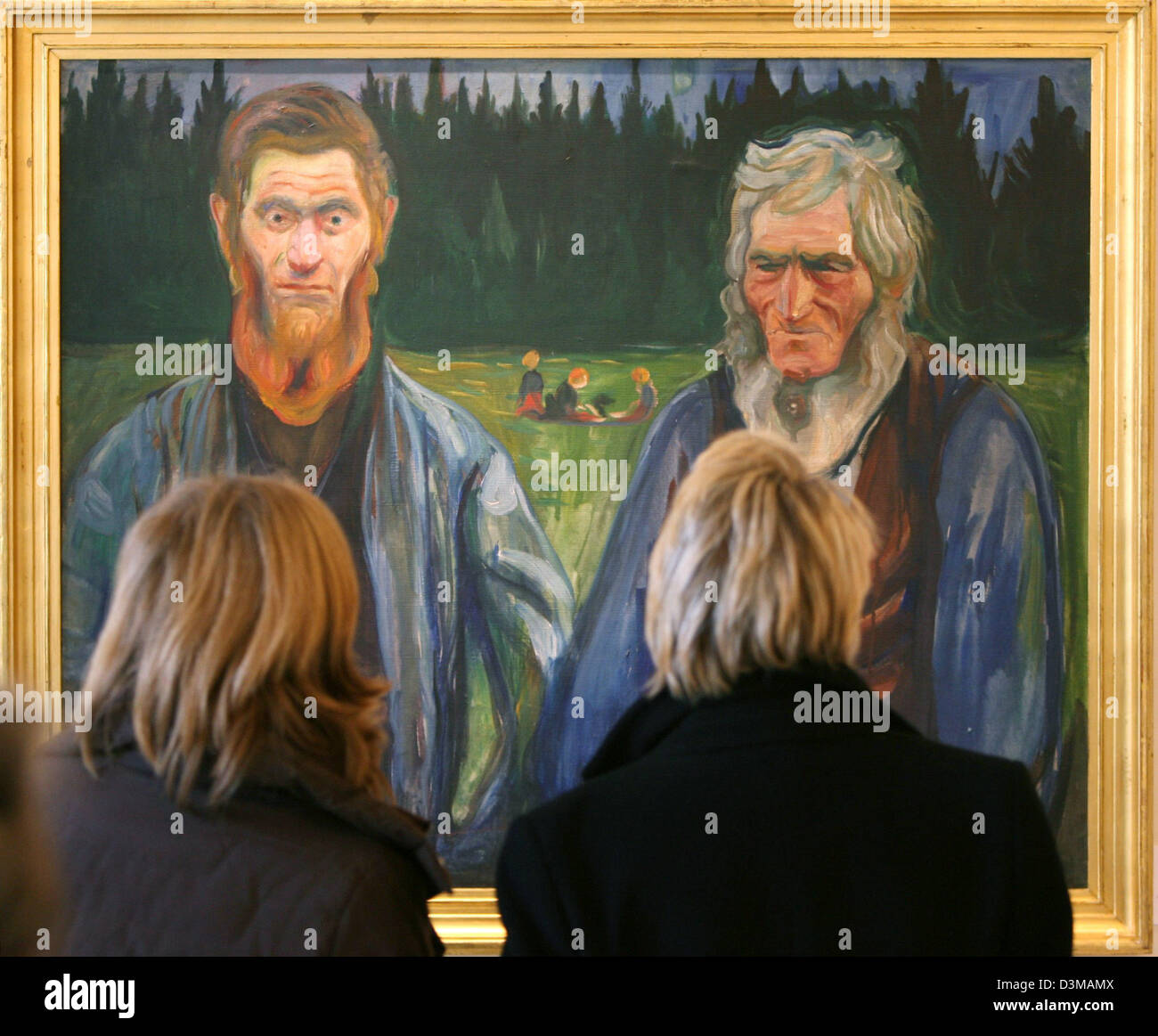 (dpa) -Visitors look at the painting 'Generations' by Edvard Munch from ...