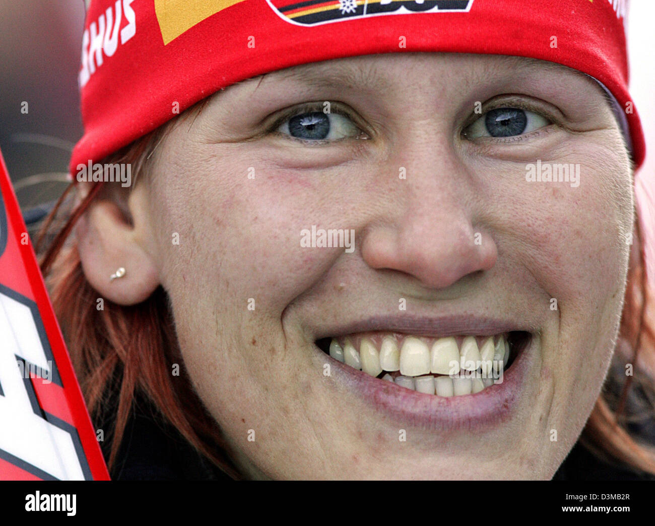 (dpa) - German biathlete Kati Wilhelm smiles during the award ceremony ...