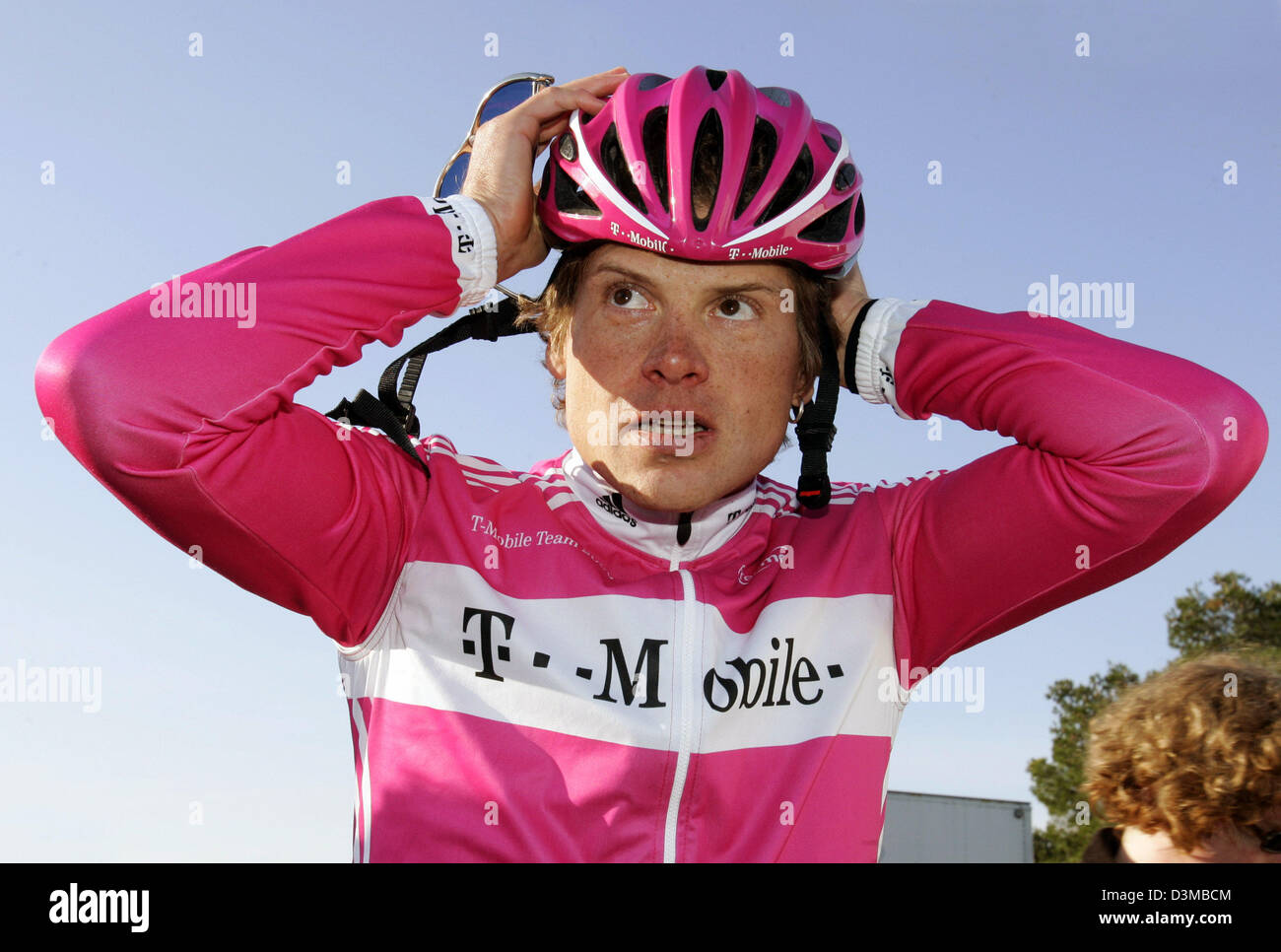 (dpa) - German cycling pro Jan Ullrich of Team T-Mobile puts on his ...