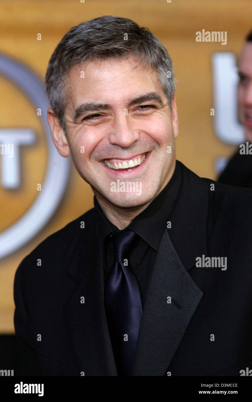 Actor George Clooney arrives on the red carpet during the 12th Annual ...