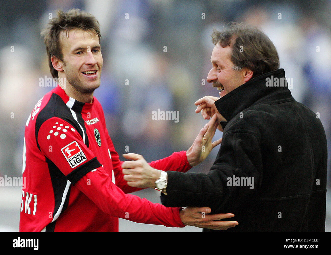 Christoph Dabrowski (L) of Hanover cheers his goal with his coach Peter ...