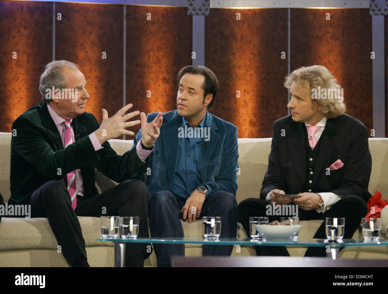 German actors Friedrich von Thun (L) and Jan Josef Liefers chat with ...