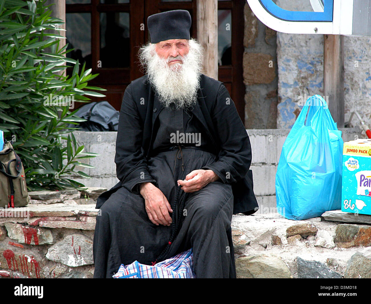 (dpa file) - A monk of the autonomous-monatic republic of Athos sits on ...