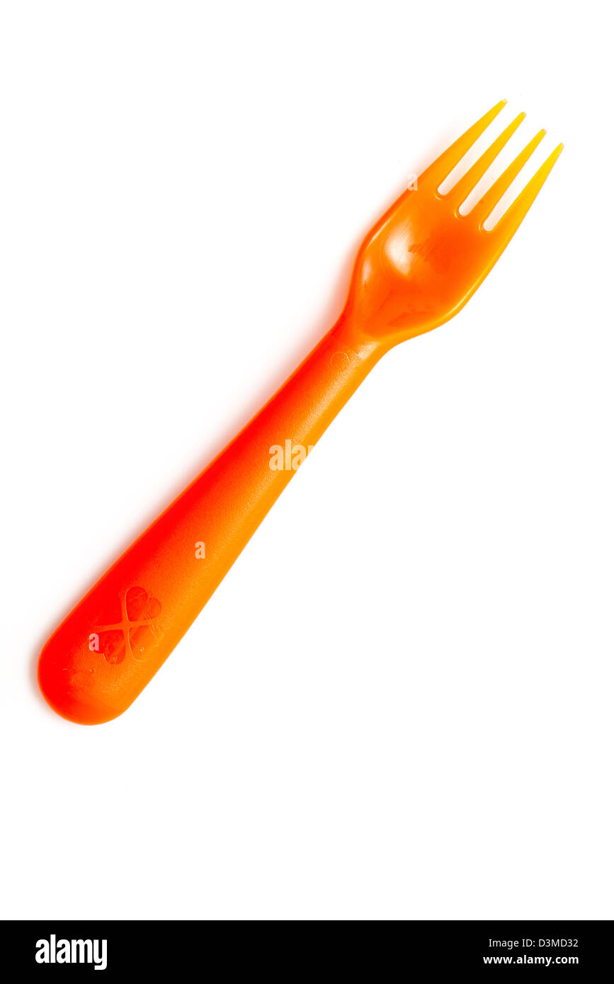 green plastick fork on white background Stock Photo - Alamy