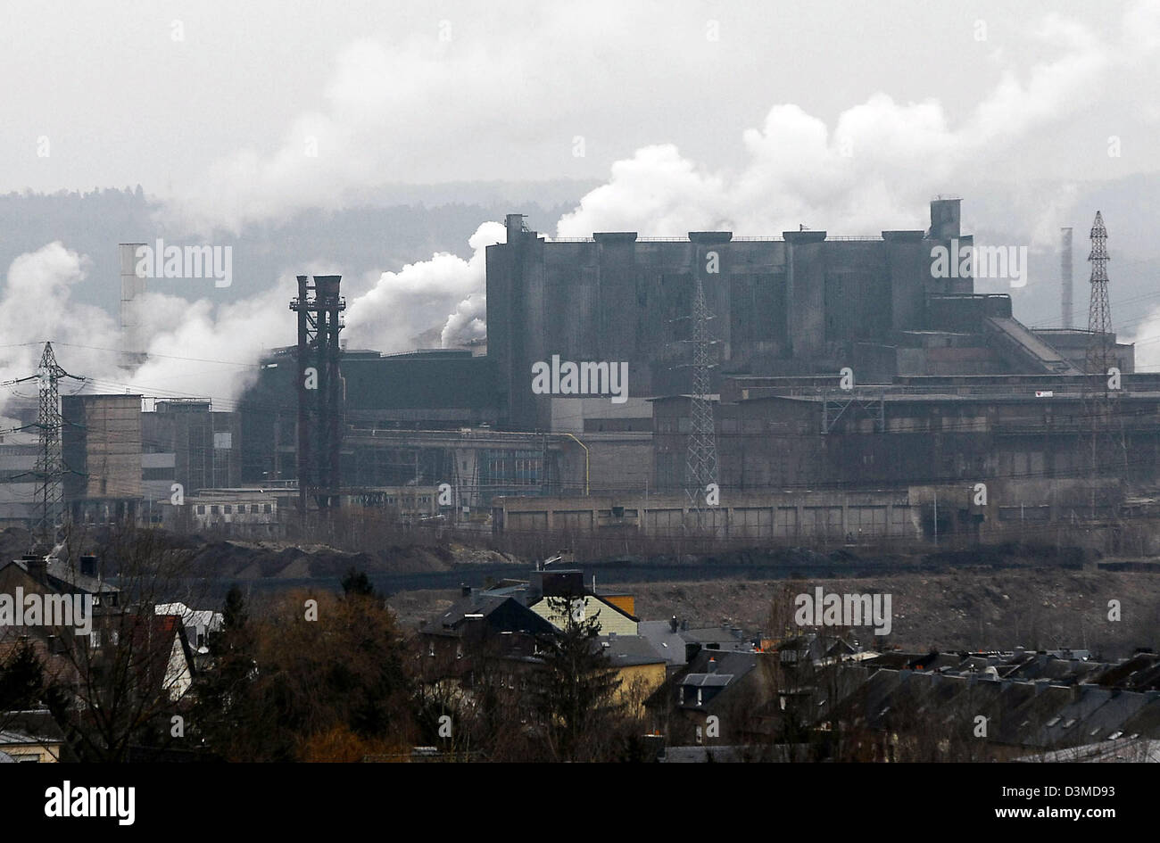 The steel mill of steel producing company Arcelor rises behind the ...