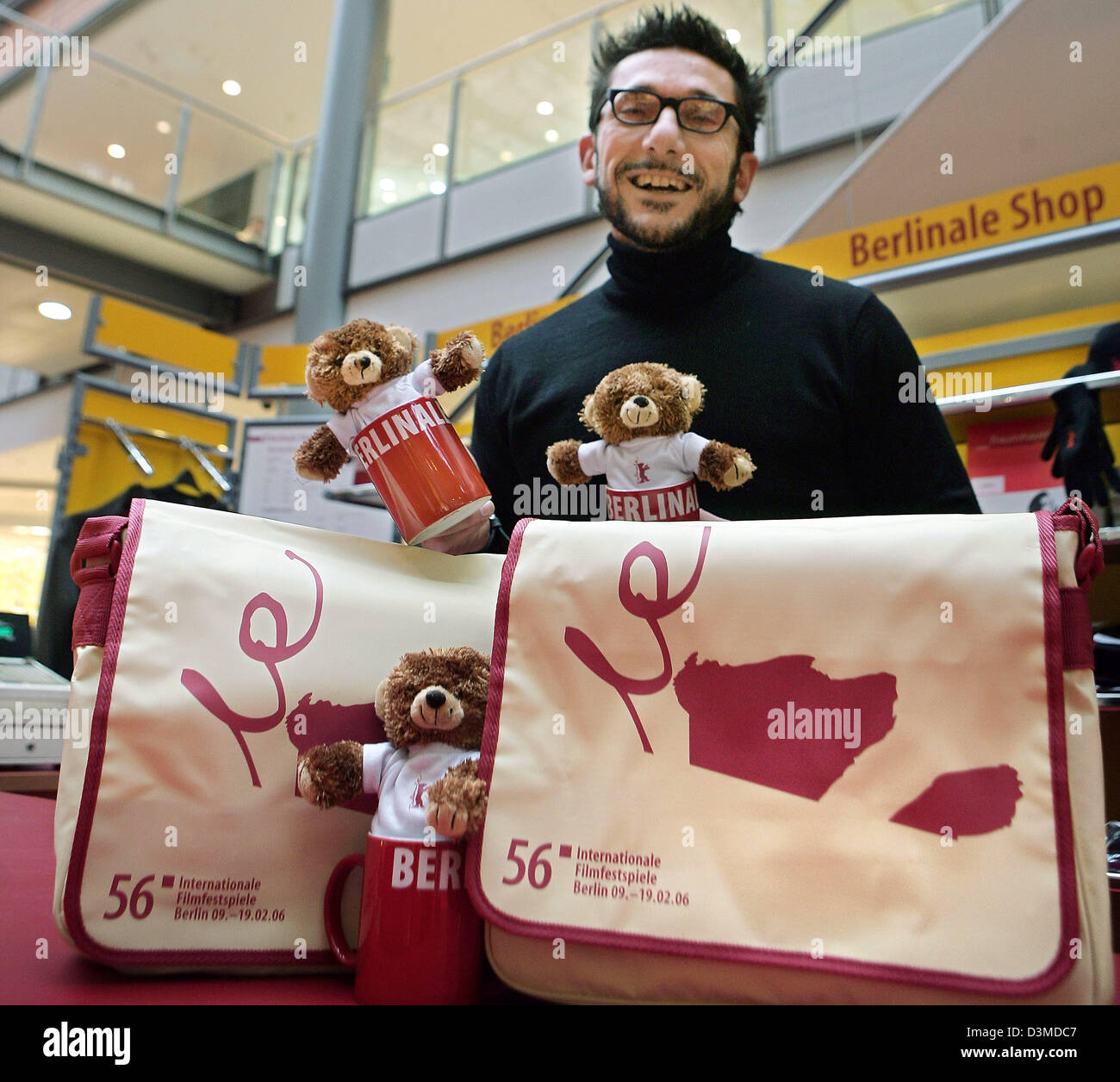 Salesman Julio Conte presents some souvenirs of the 56th International ...