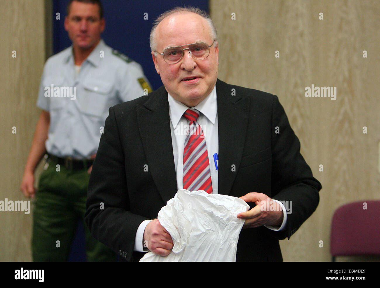 Holocaust gainsayer Ernst Zuendel (R) appears for his trial at district ...