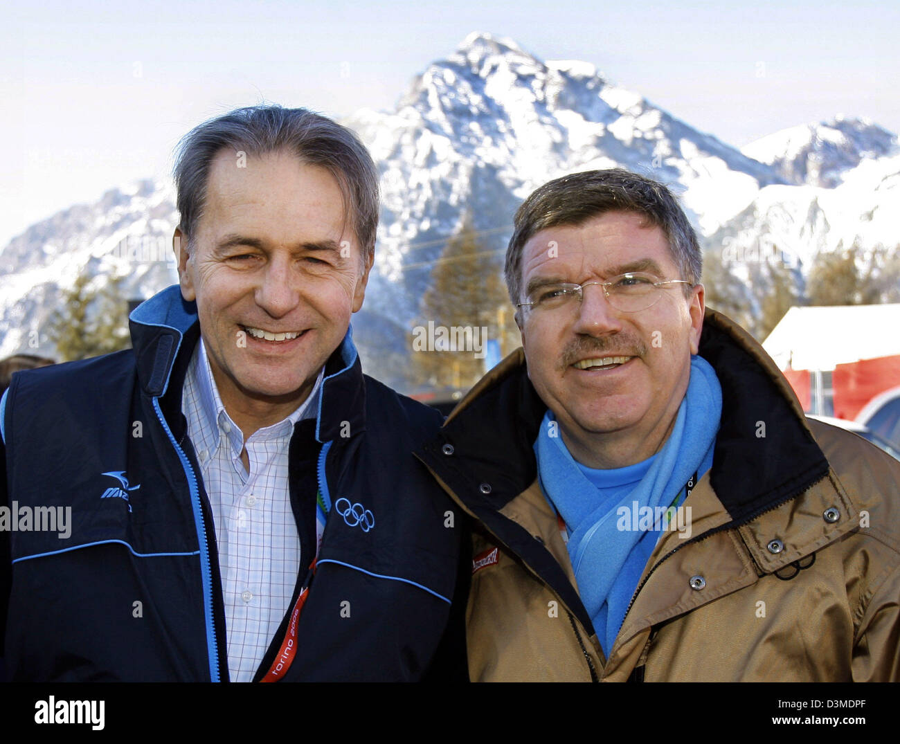 Jacques Rogge (L), president of the International Olympic Committee ...
