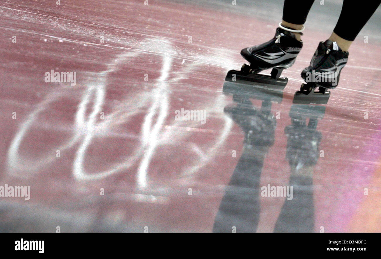 During a speed skating training run the olympic rings are reflected on ...