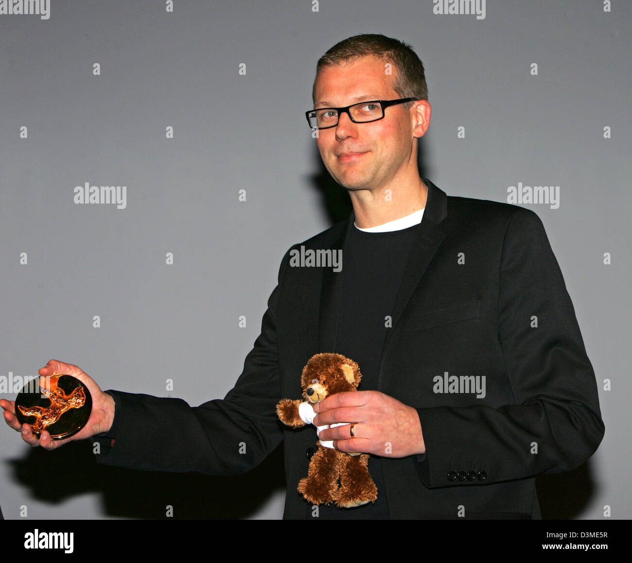 Swedish director Jonas Odell proudly presents his 'Golden Bear' Award ...
