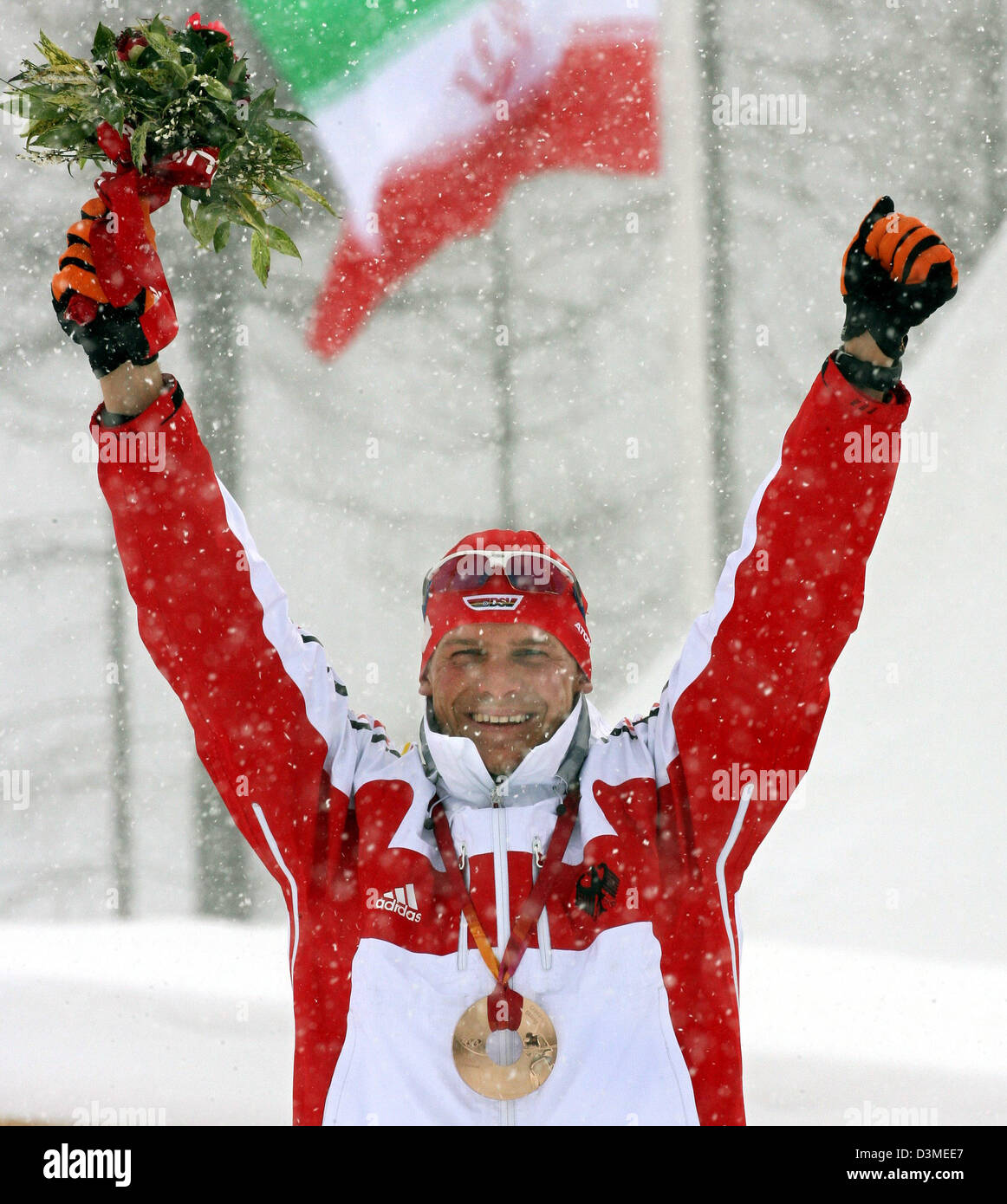 German cross-country skier Tobias Angerer cheers his bronze medal at ...