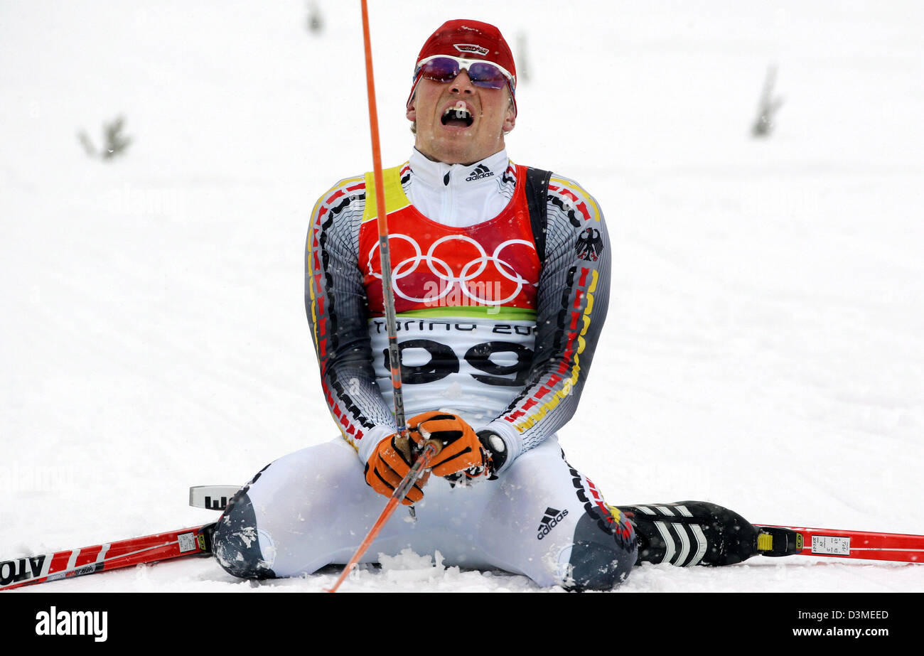 German cross-country skier Tobias Angerer arrives exhausted the finish ...