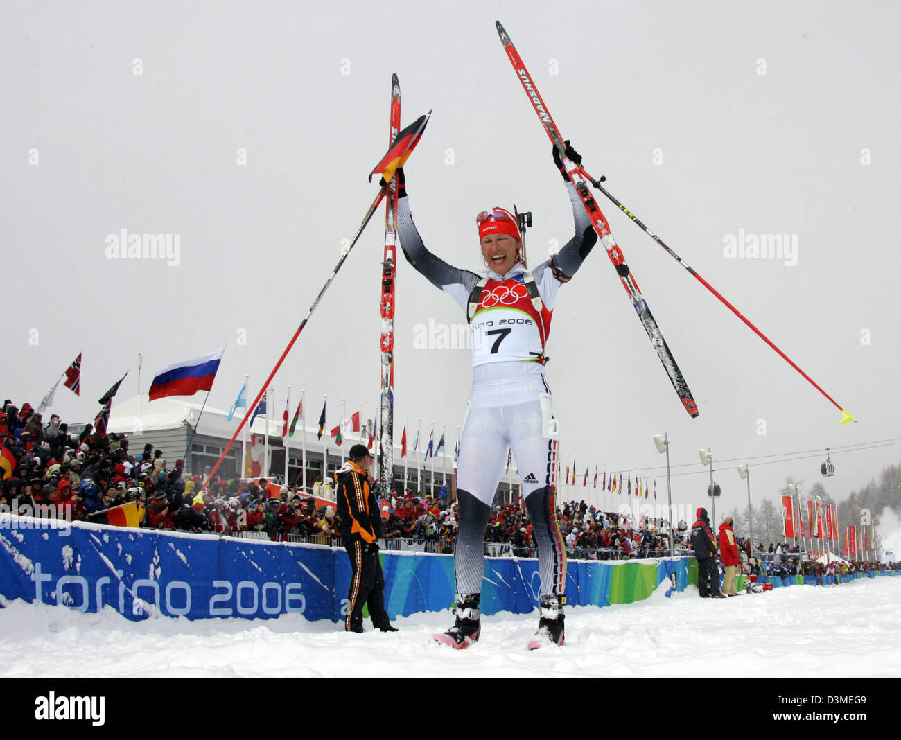 (dpa) - German biathlete Kati Wilhelm celebrates after the women's 10km ...