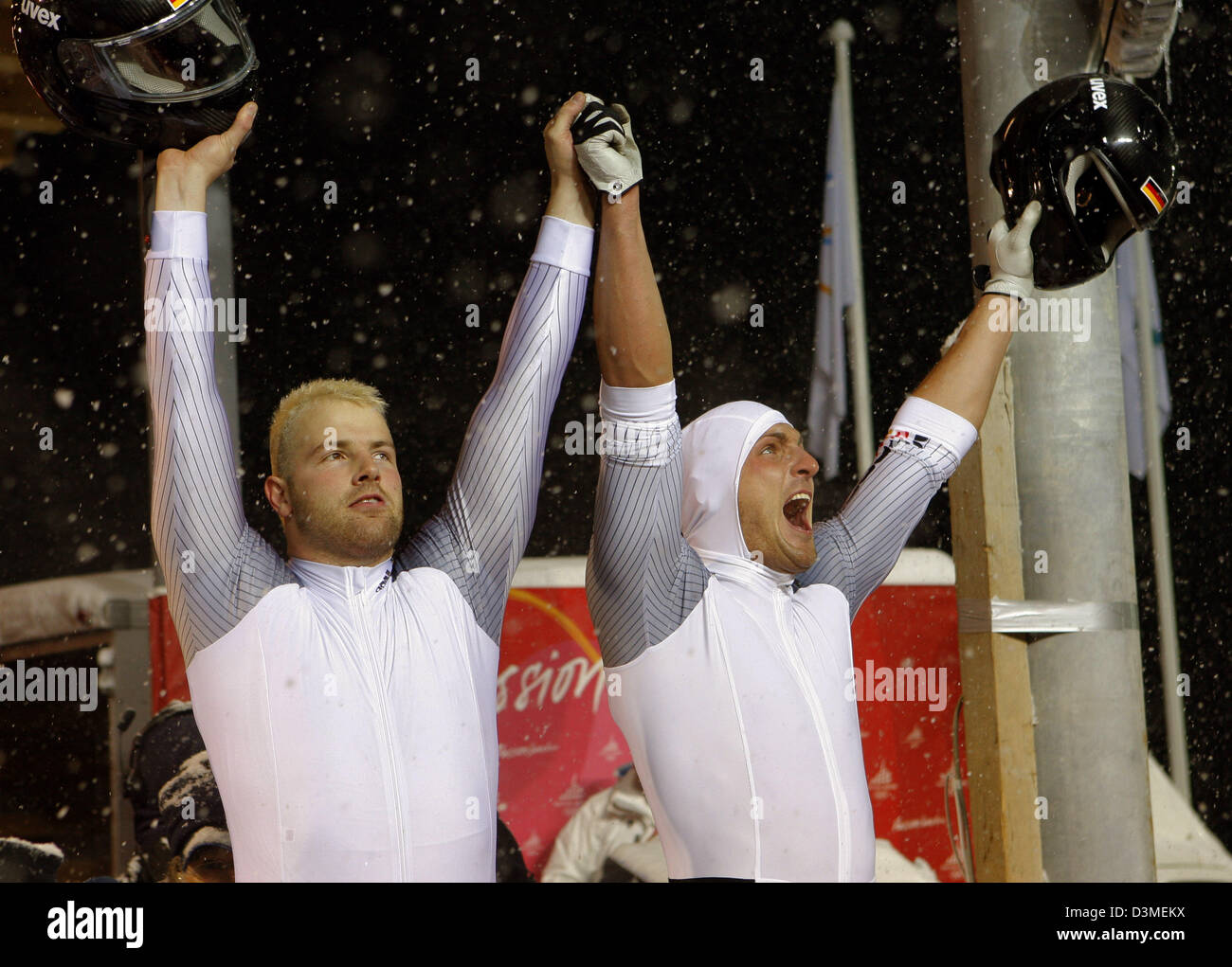 German bobsleighers Andre Lange (L) and Kevin Kuske celebrate after ...