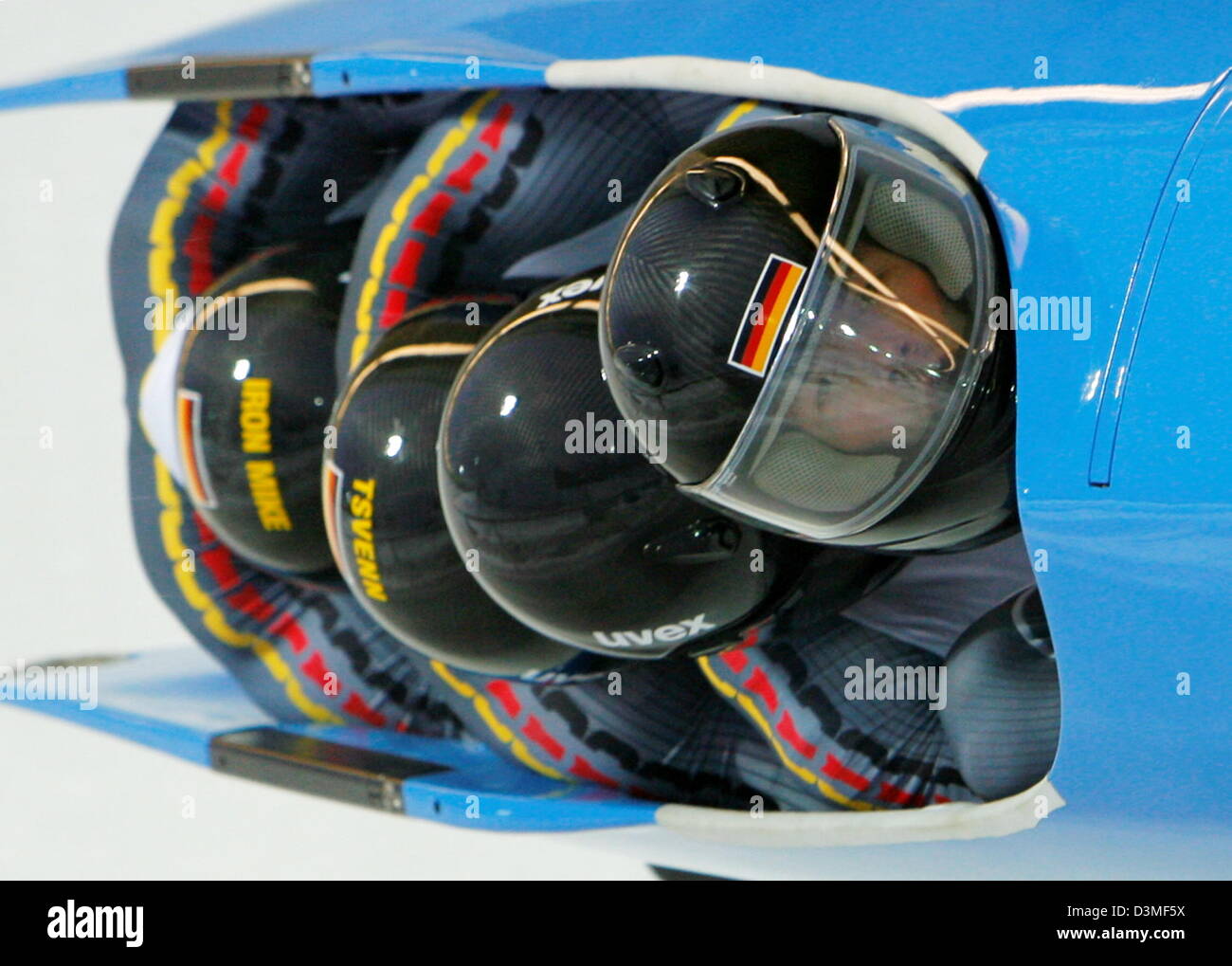 German bobsleigher Andre Lange (R) and his team (from R) Rene Hoppe ...