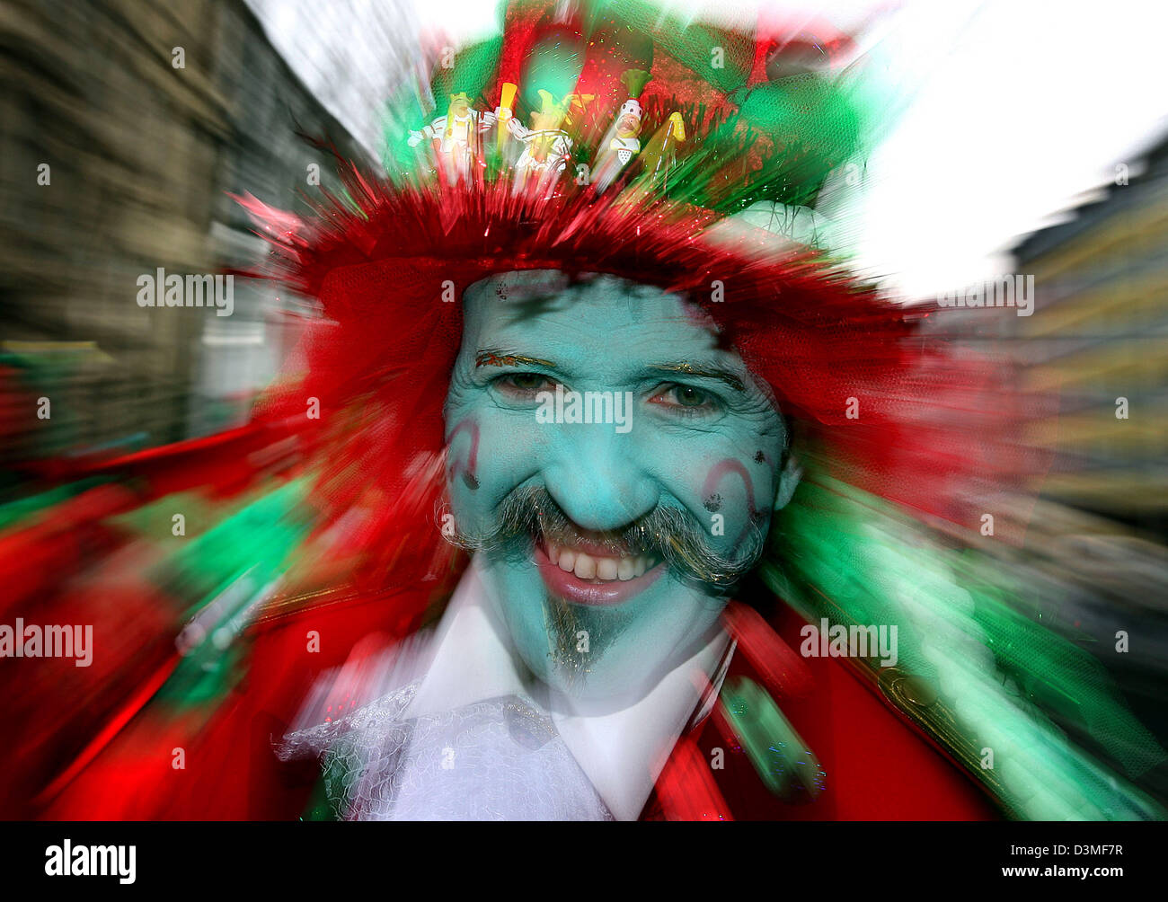 (dpa) - A man participates in a colorful fantasy costume in the ...